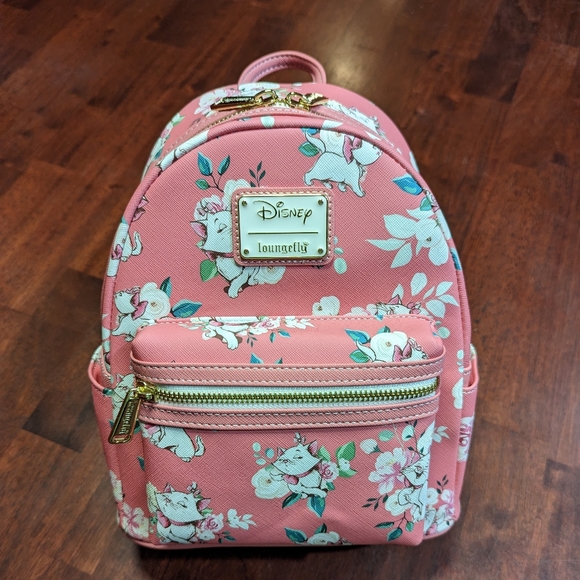 Loungefly | Bags | Disney Loungefly Pink Backpack Featuring Marie From ...